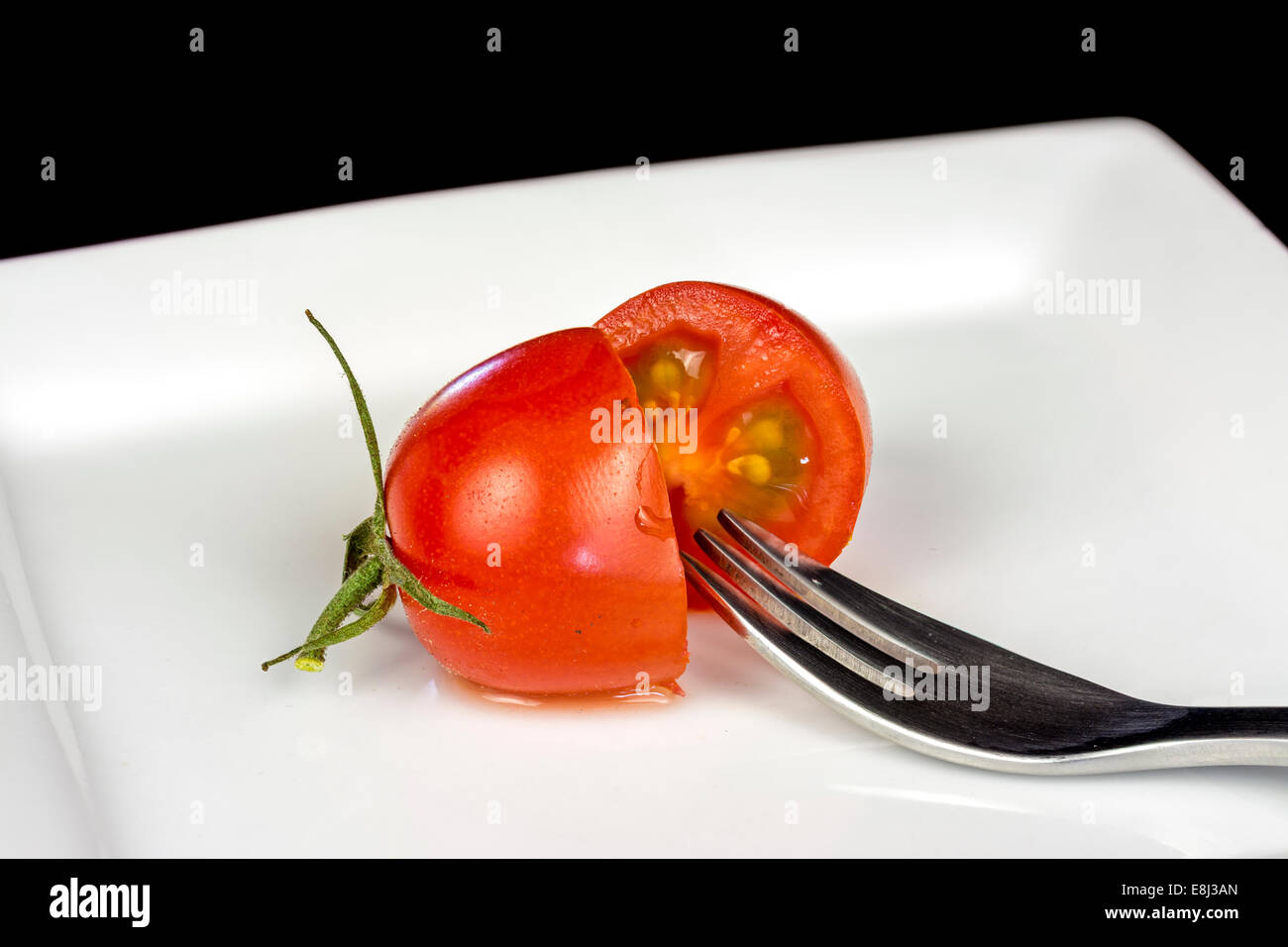 Tomato cut open hi-res stock photography and images - Alamy
