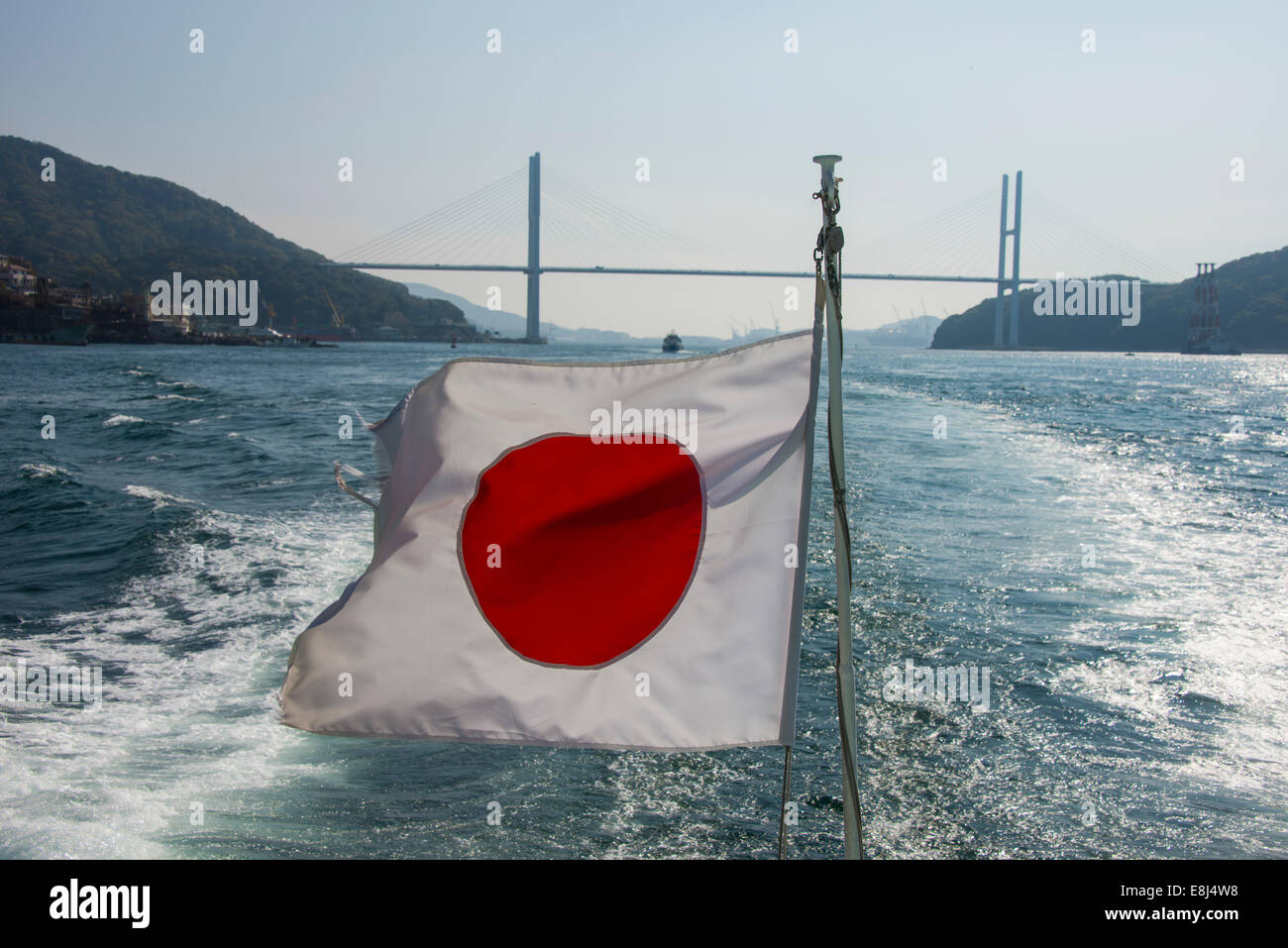 Japanese flag, Megami Bridge at the back, Nagasaki, Japan Stock Photo ...