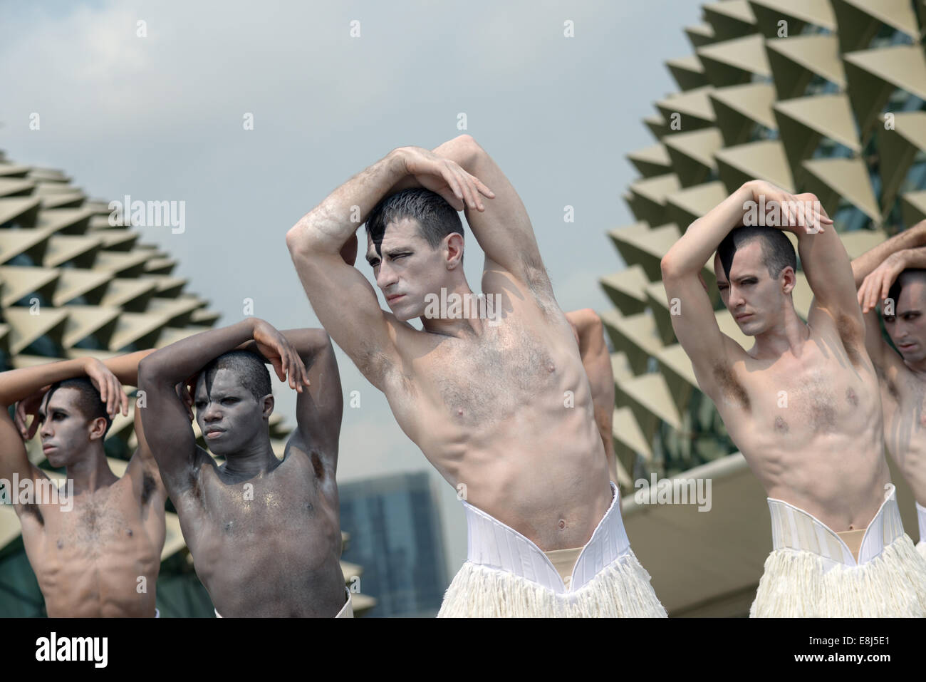 Singapore. 9th Oct, 2014. Dancers pose for a photo at Singapore's ...