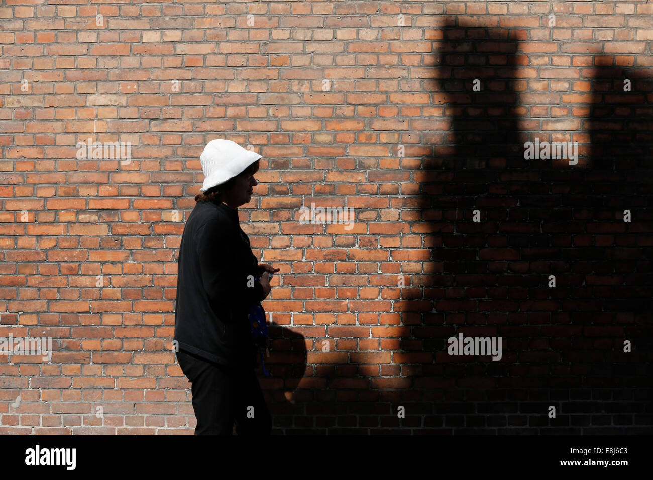 Woman and shadow Stock Photo - Alamy