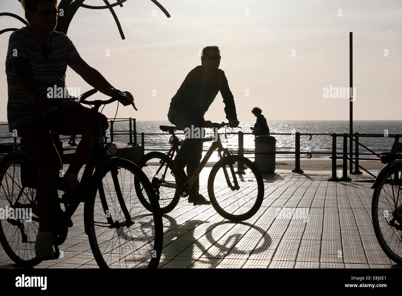 Seaside promenade at sunset Stock Photo - Alamy