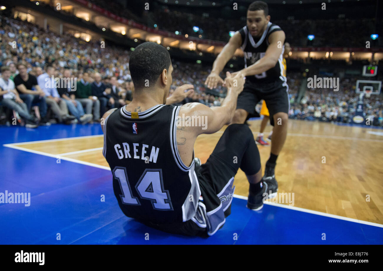 Berlin, Germany. 08th Oct, 2014. San Antonio's Cory Joseph helps Danny ...