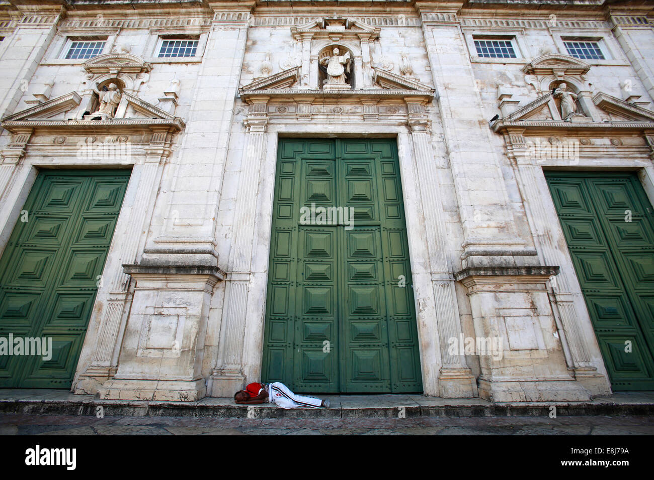Man sleeping outside Salvador cathedral basilica Stock Photo - Alamy