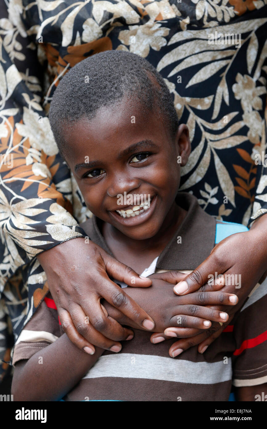 African boy with his mother Stock Photo - Alamy