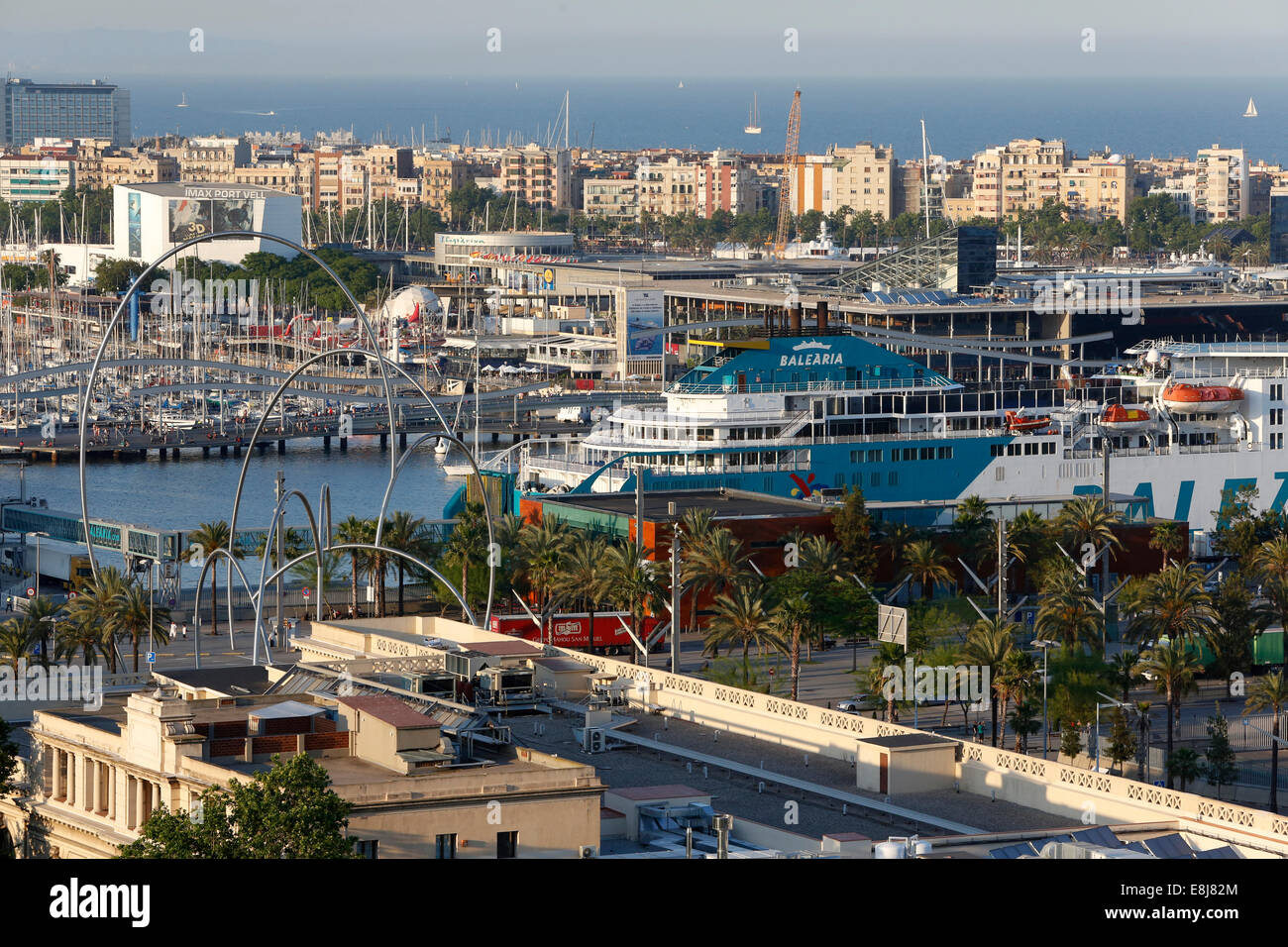 Barcelona ferry boat harbour and buildings Stock Photo - Alamy