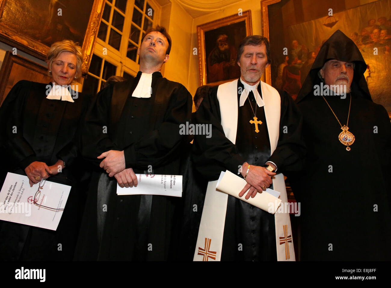 Protestant ministers and orthodox praying together Stock Photo - Alamy