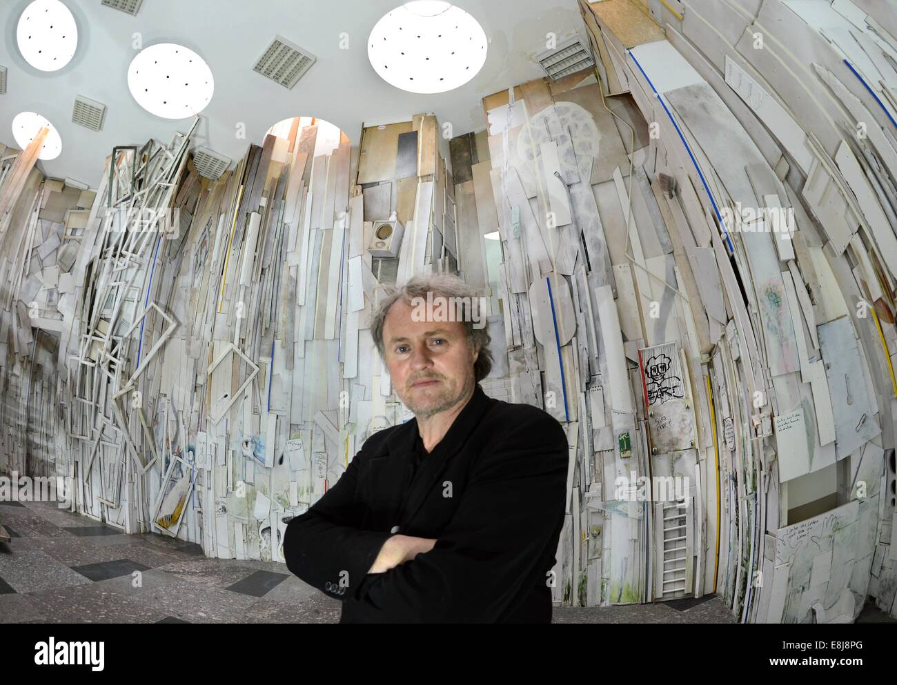 Artist Helge Hommes stands at his installation "Ur-Licht" in the Alte ...