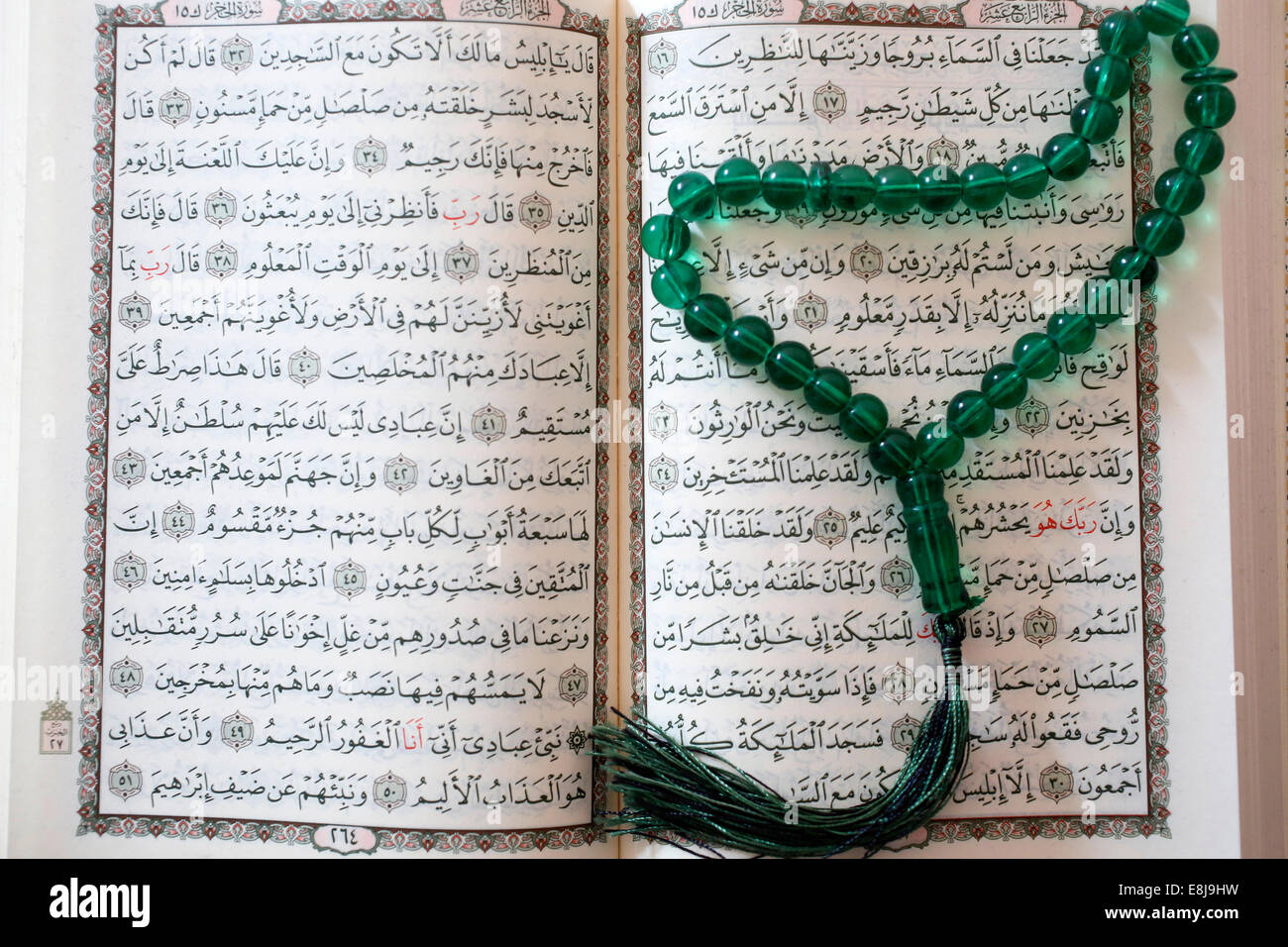 Coran and prayer beads Stock Photo - Alamy