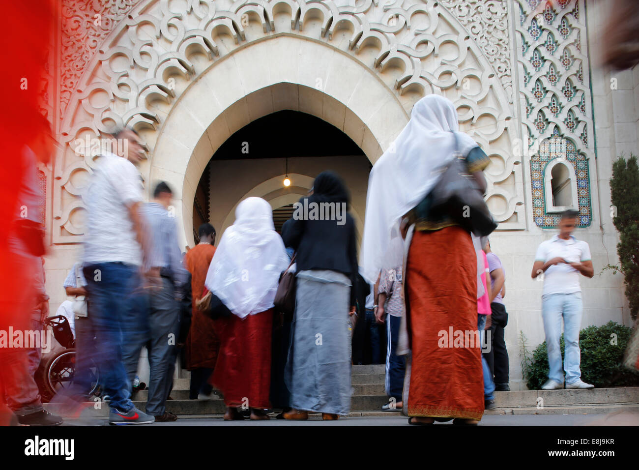 Muslims at the Paris Great Mosque on A•d El-Fitr festival Stock Photo ...