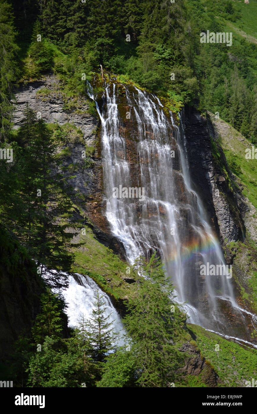 Waterfall and rainbow Stock Photo - Alamy
