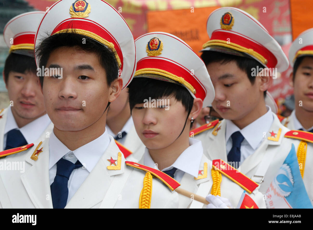 Chinese New Year. Men in uniforms Stock Photo - Alamy