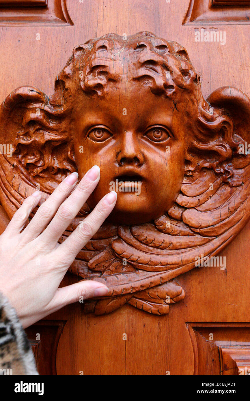 Angel and hand Stock Photo - Alamy