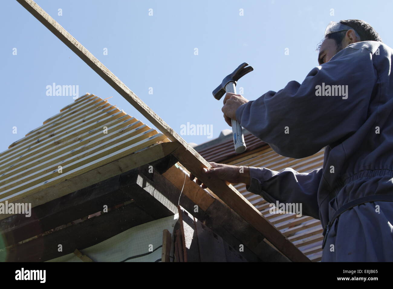 Fixing roof hi-res stock photography and images - Alamy