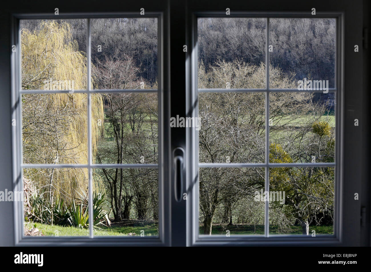 Landscape seen through a window Stock Photo - Alamy