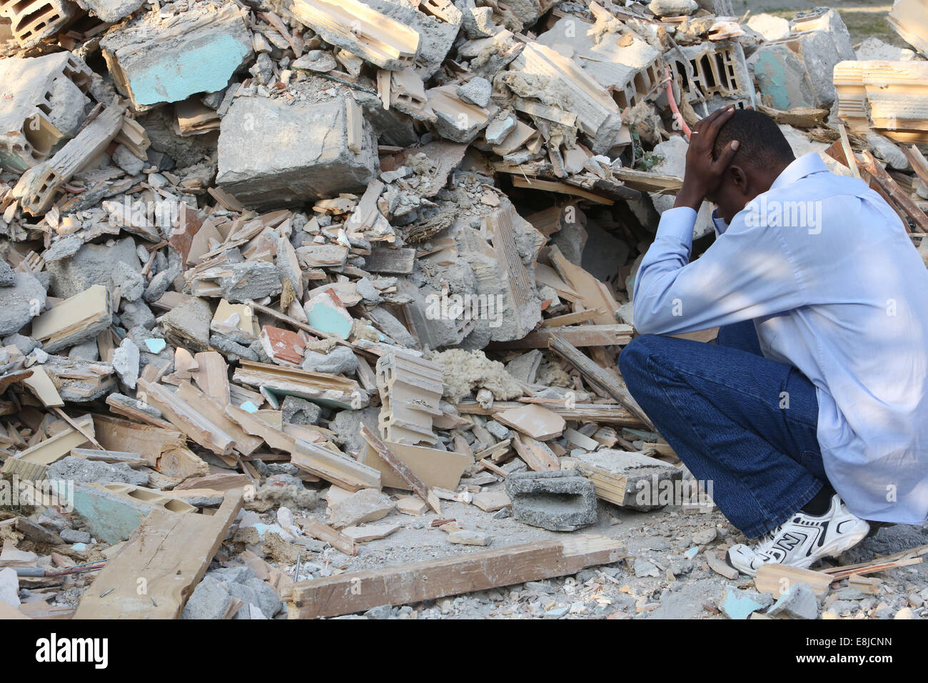 Destroyed building man hi-res stock photography and images - Alamy