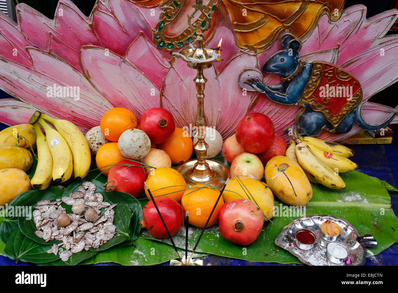 Ganesh festival in paris. Offerings to Ganesh. The rat is Ganesh's ...