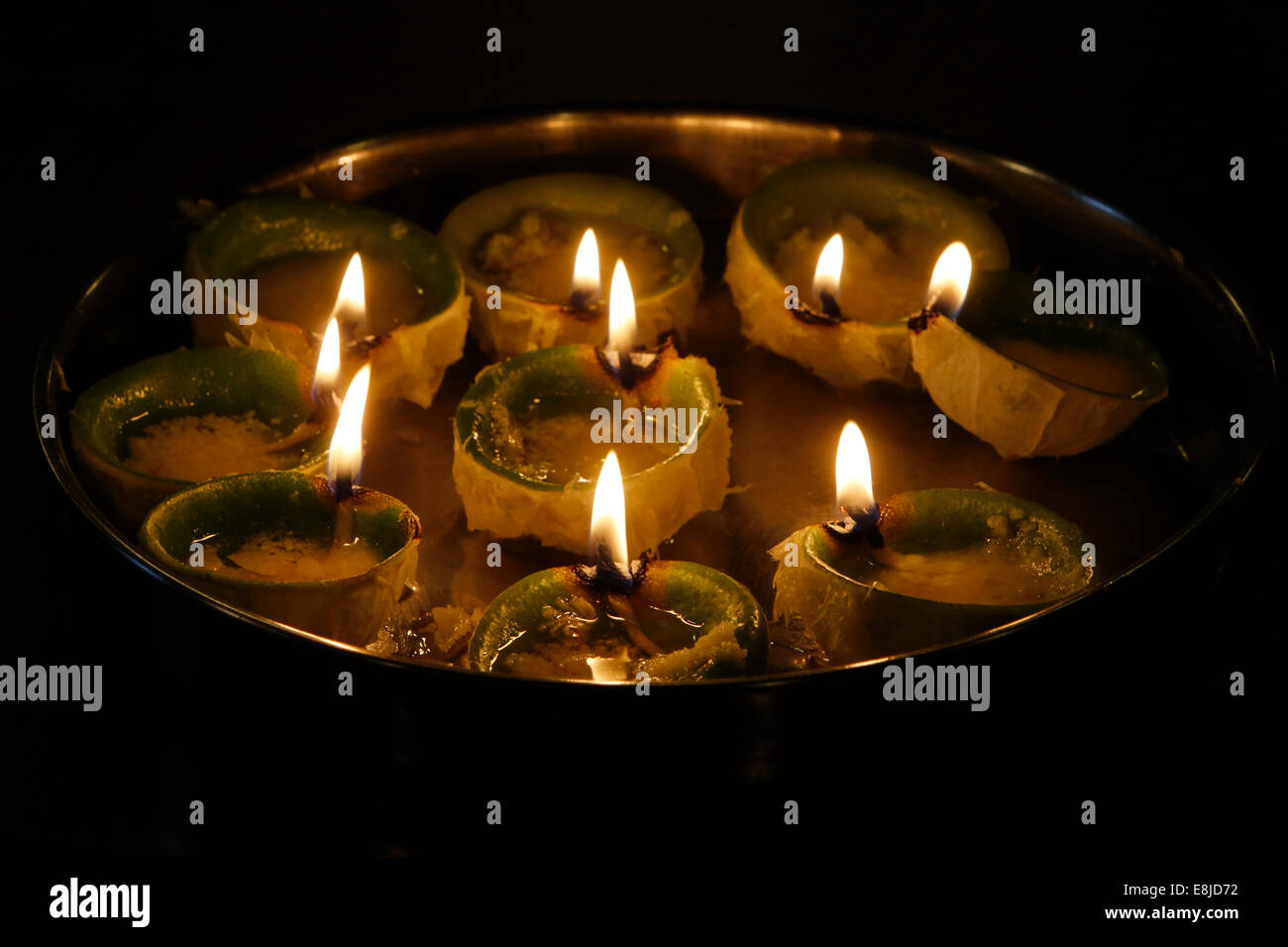 Light offerings in Muthumariamman Hindu temple Stock Photo - Alamy