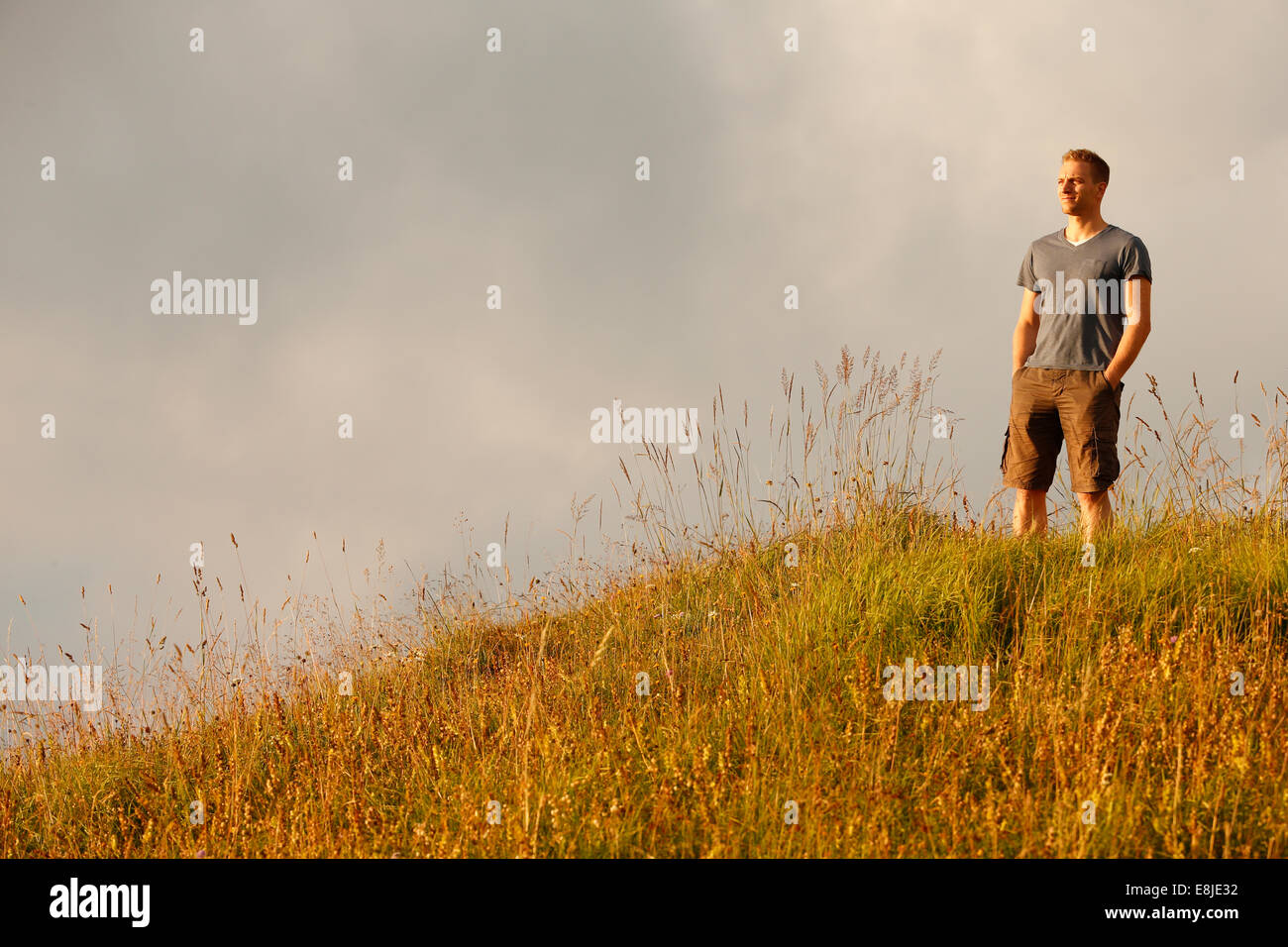Man walking alone Stock Photo - Alamy