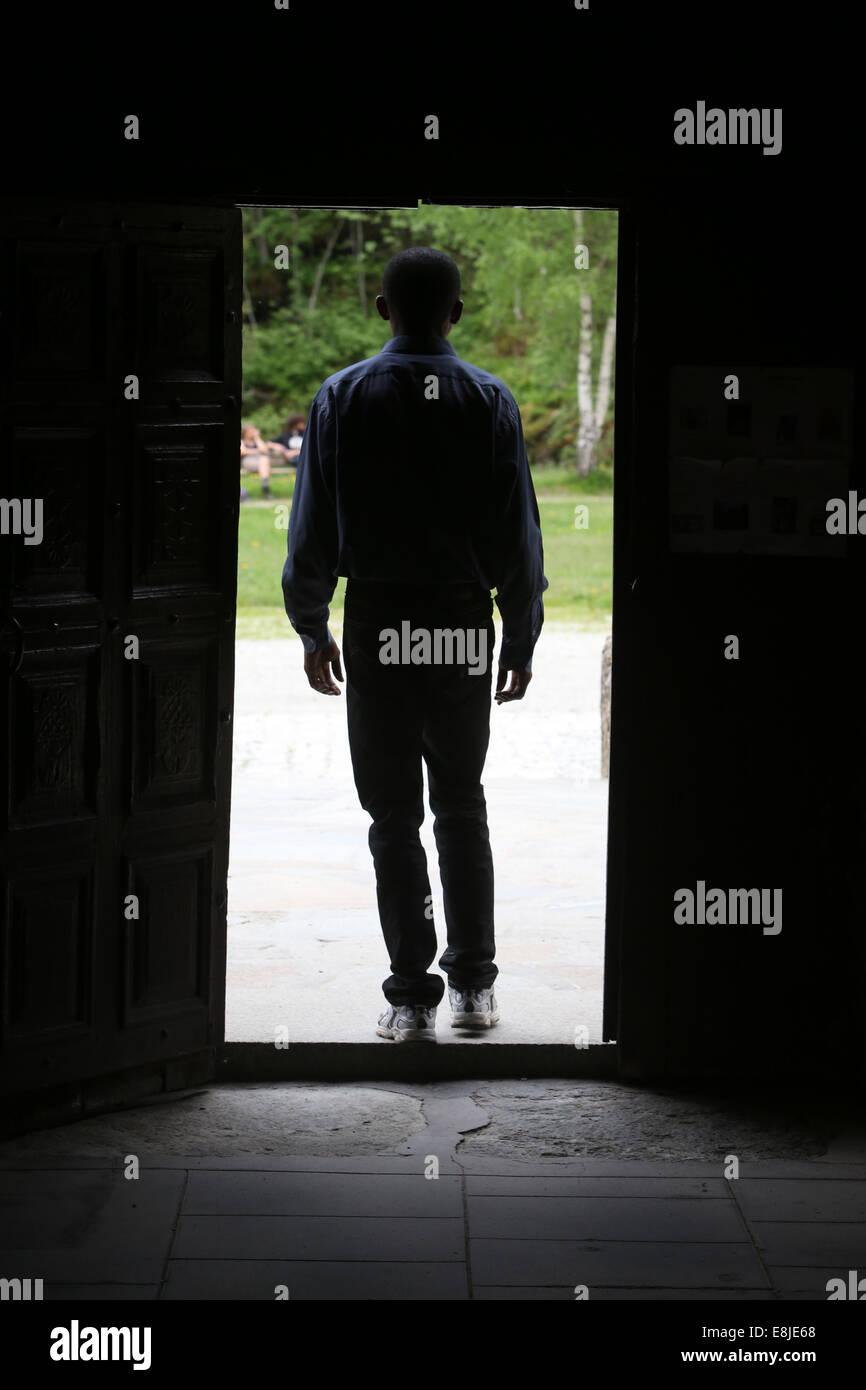 Man going out of a church Stock Photo - Alamy