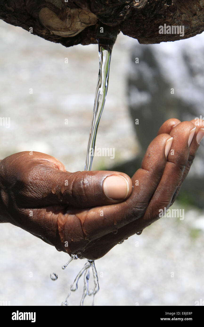 Hand flowing water hi-res stock photography and images - Alamy
