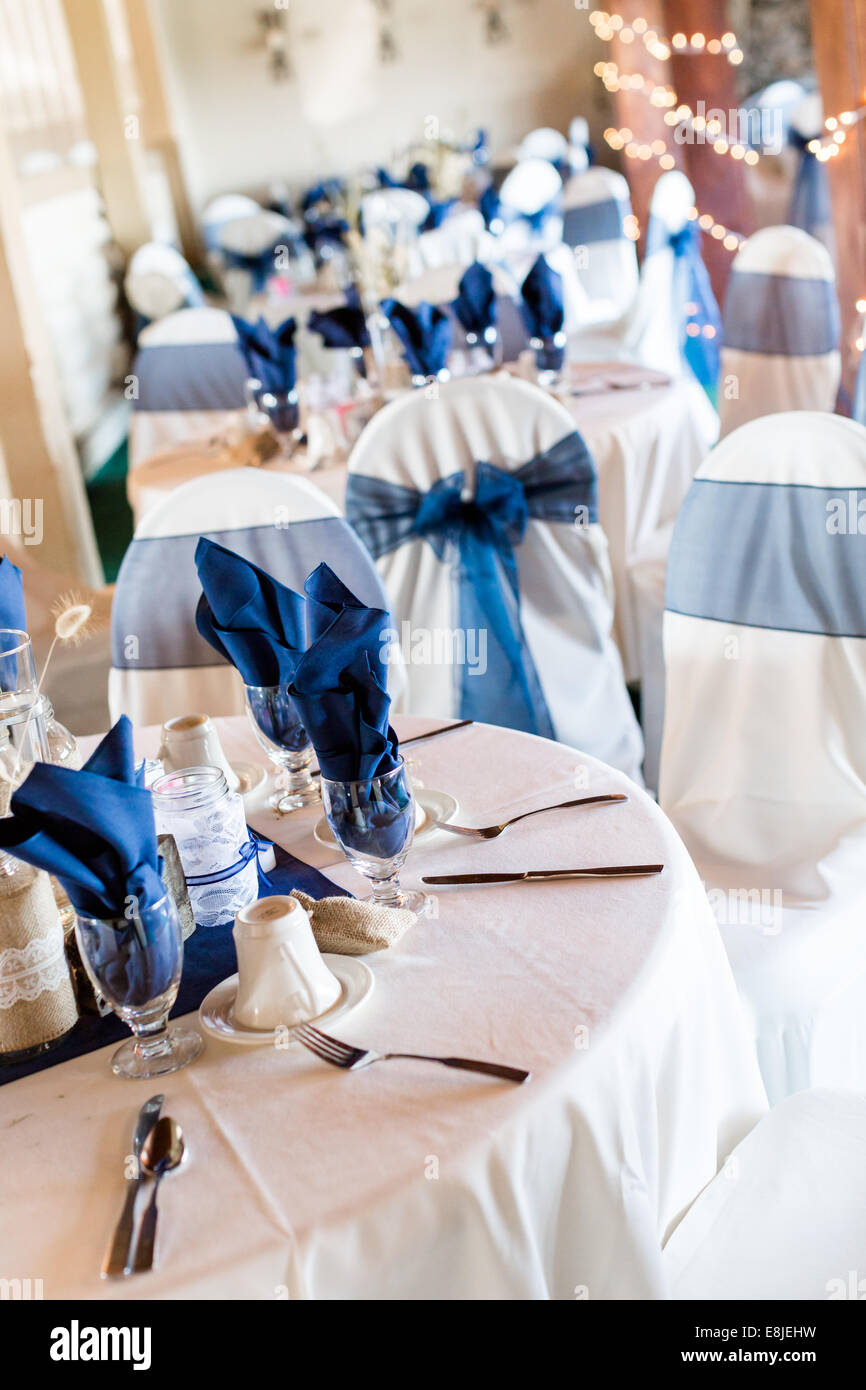 Banquet hall decorated for wedding in white and blue Stock Photo - Alamy