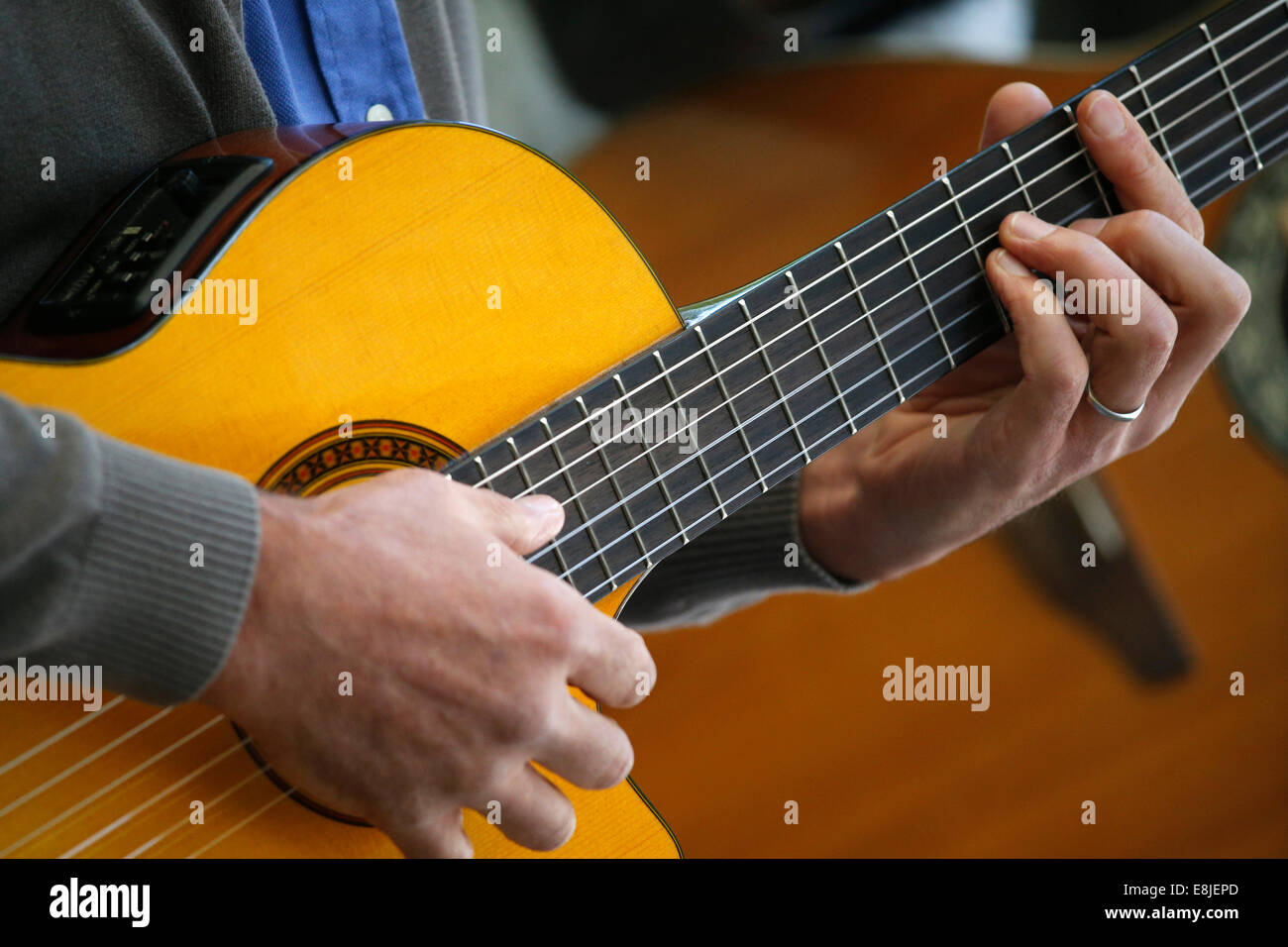 Catholic mass. Guitar player Stock Photo - Alamy