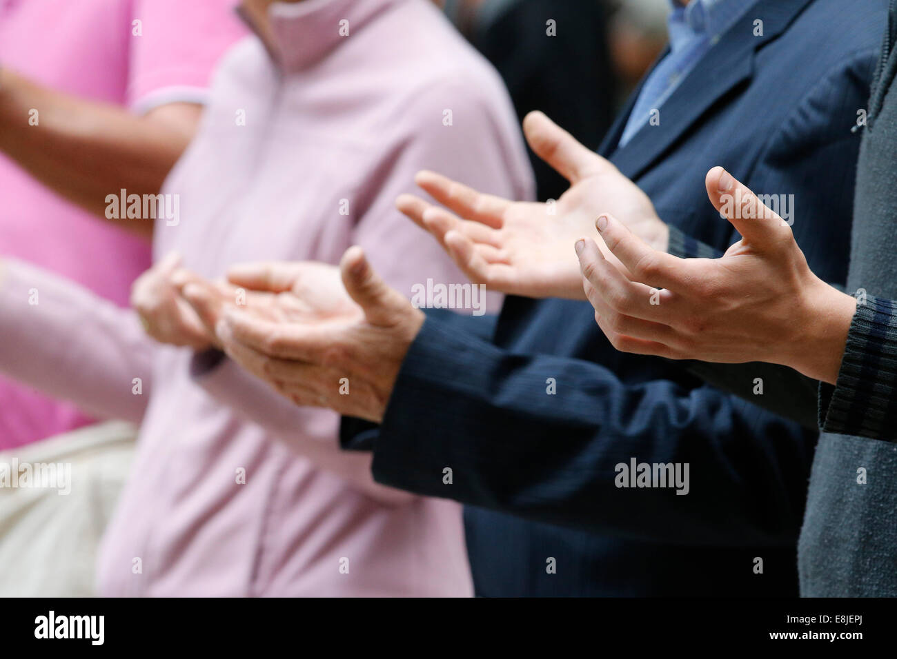 Catholic mass. Pilgrims praying Stock Photo - Alamy