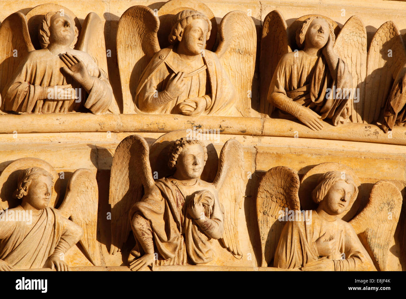 Notre Dame cathedral, Paris. Western facade arch sculptures depicting ...