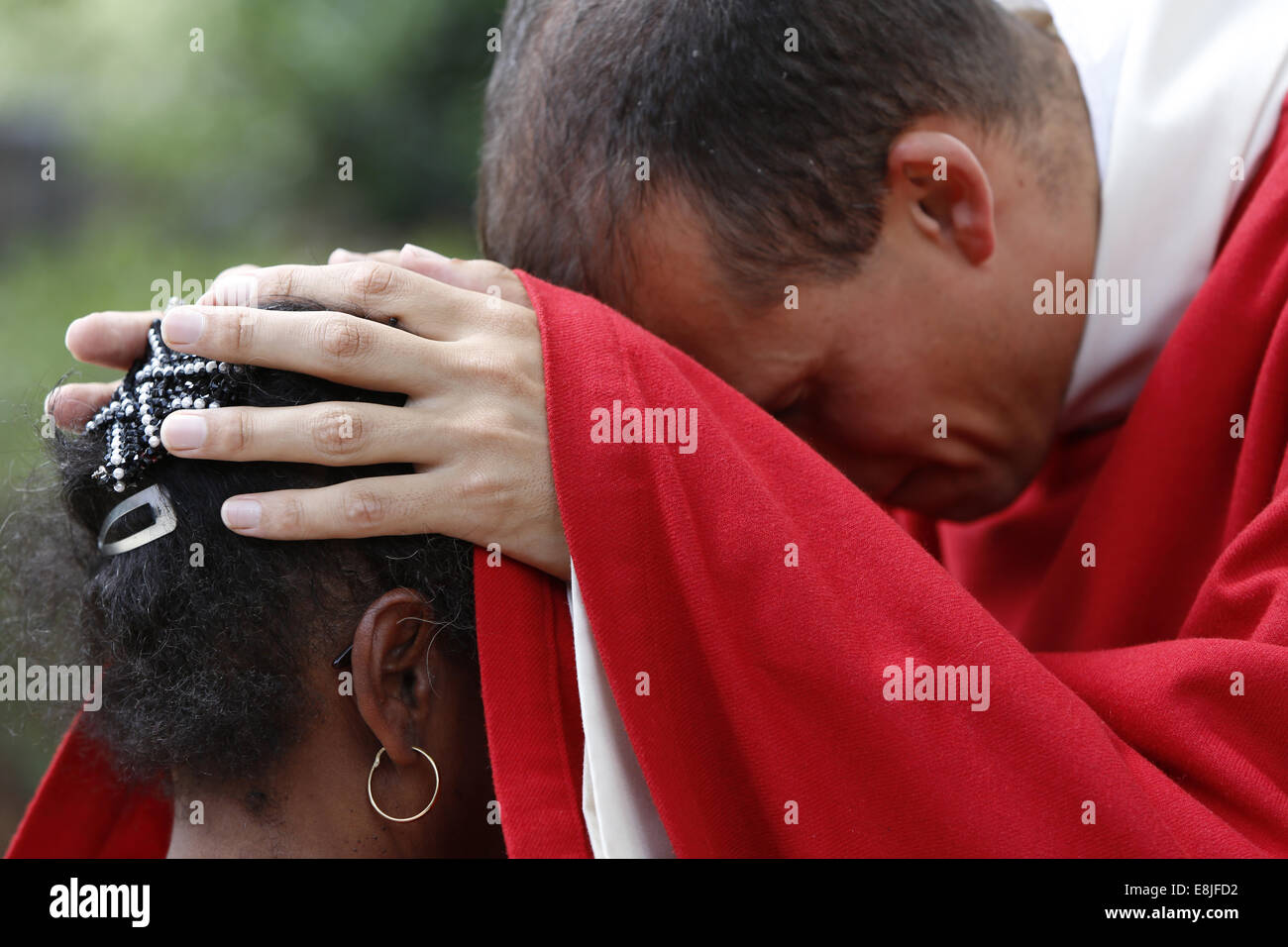 Newly ordained catholic priest giving a blessing Stock Photo - Alamy