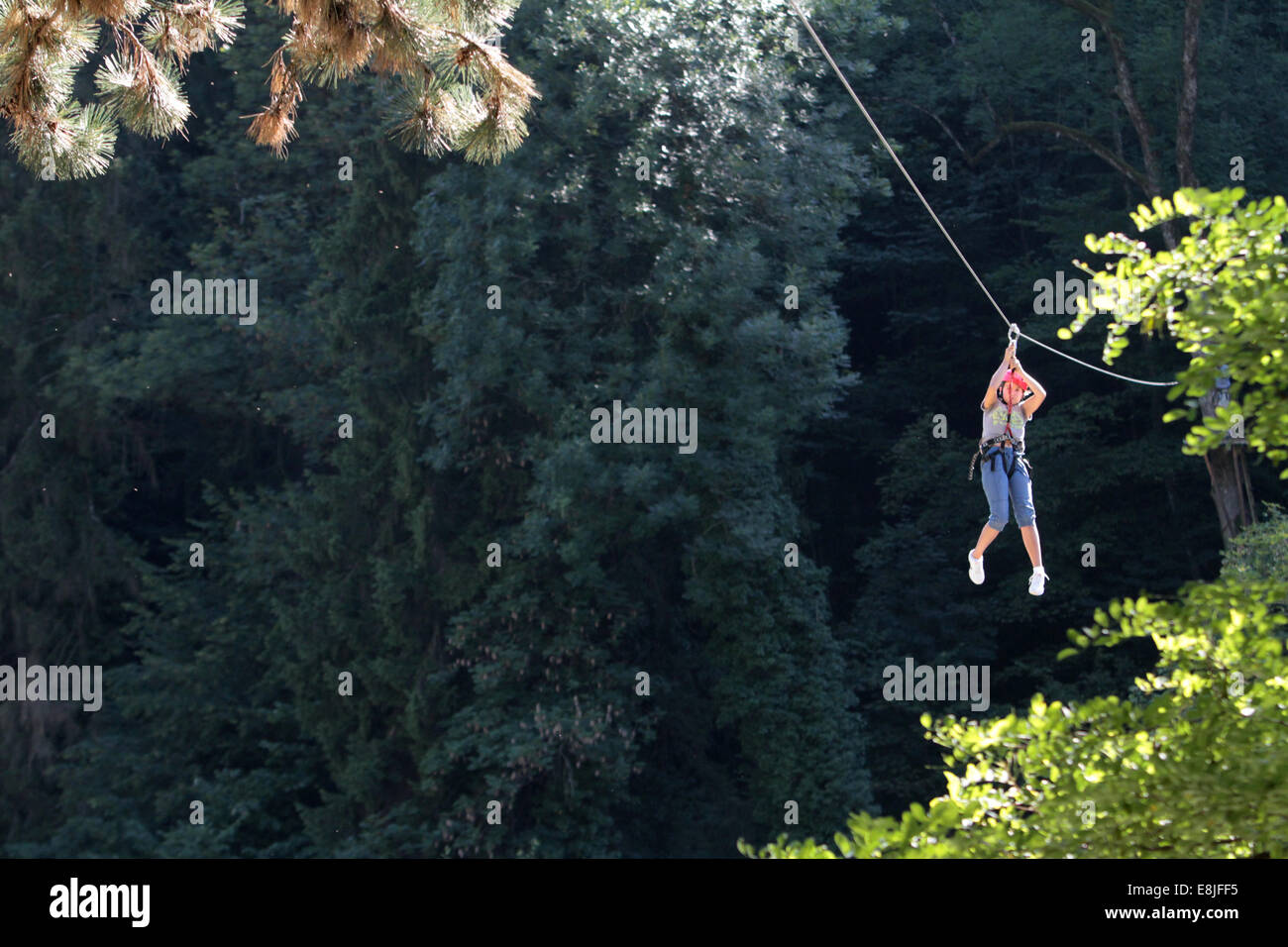 Child on a zip line Stock Photo - Alamy