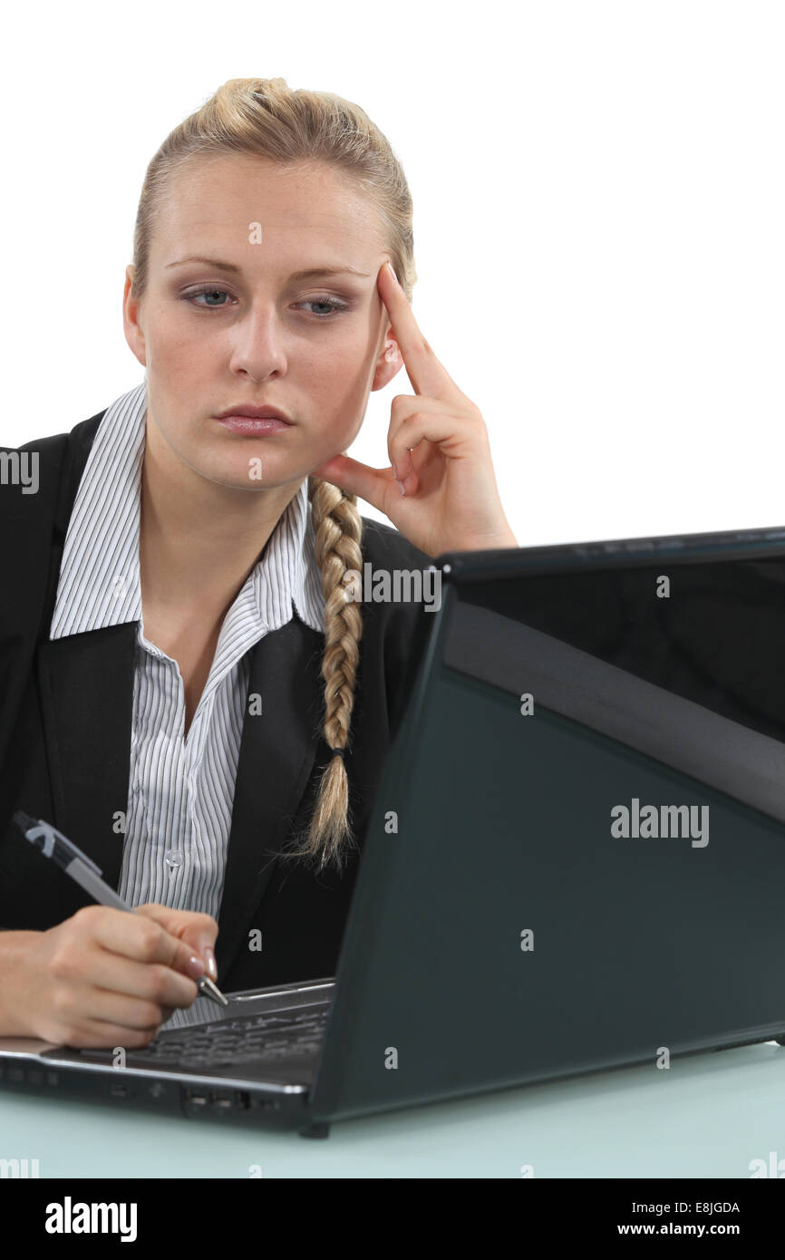 Tired woman working Stock Photo - Alamy