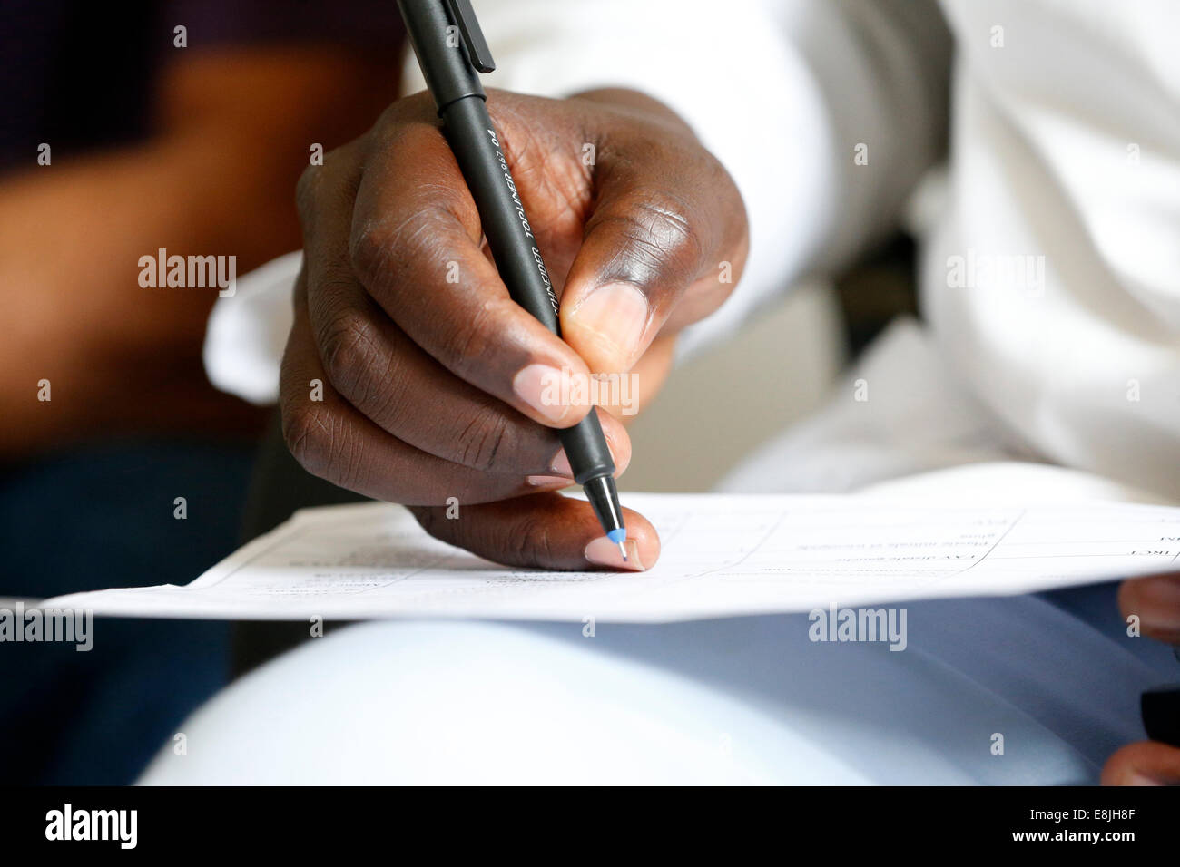 Man writing with a pencil Stock Photo - Alamy