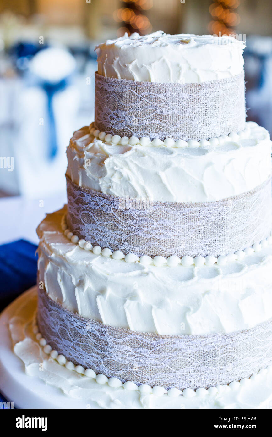 Three stack simple wedding cake in banquet hall Stock Photo - Alamy