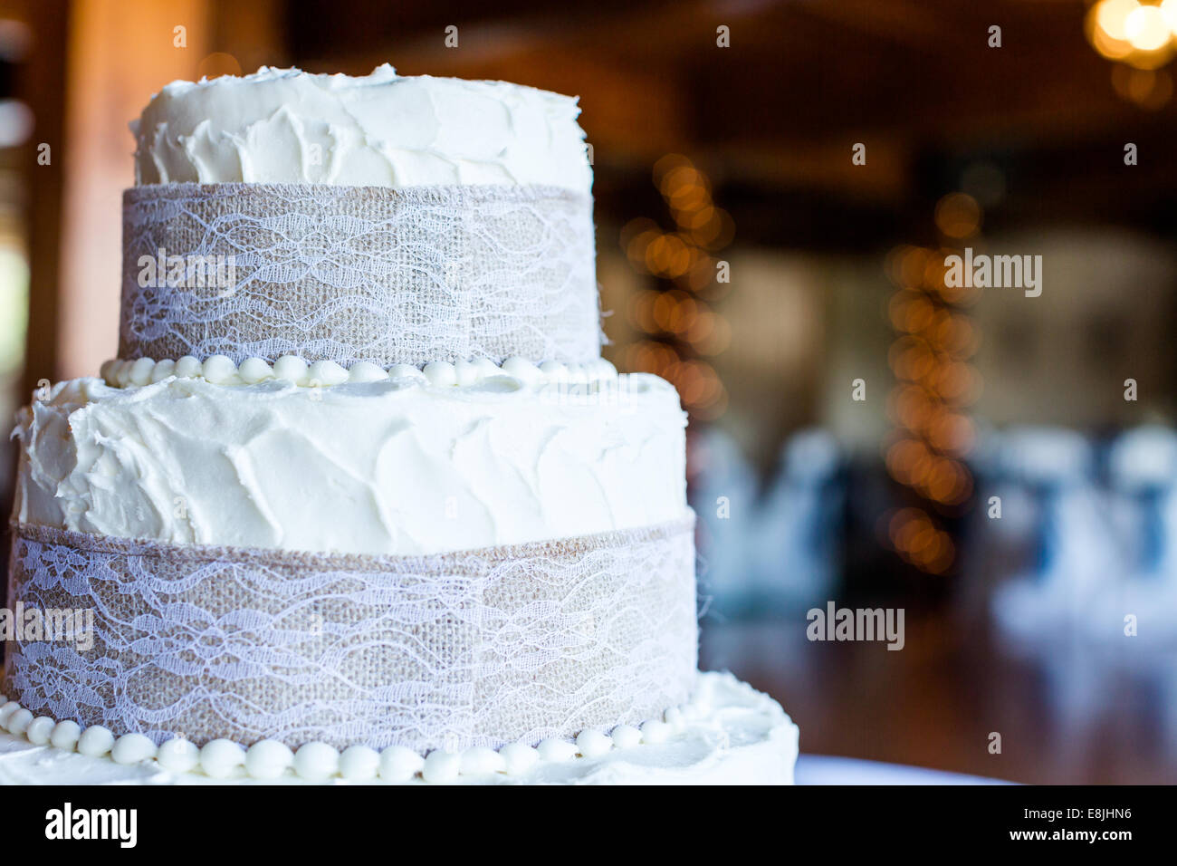 Three stack simple wedding cake in banquet hall Stock Photo - Alamy