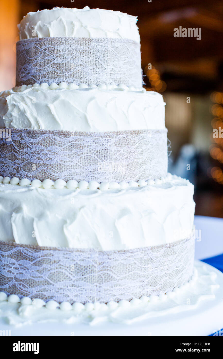 Three stack simple wedding cake in banquet hall Stock Photo - Alamy