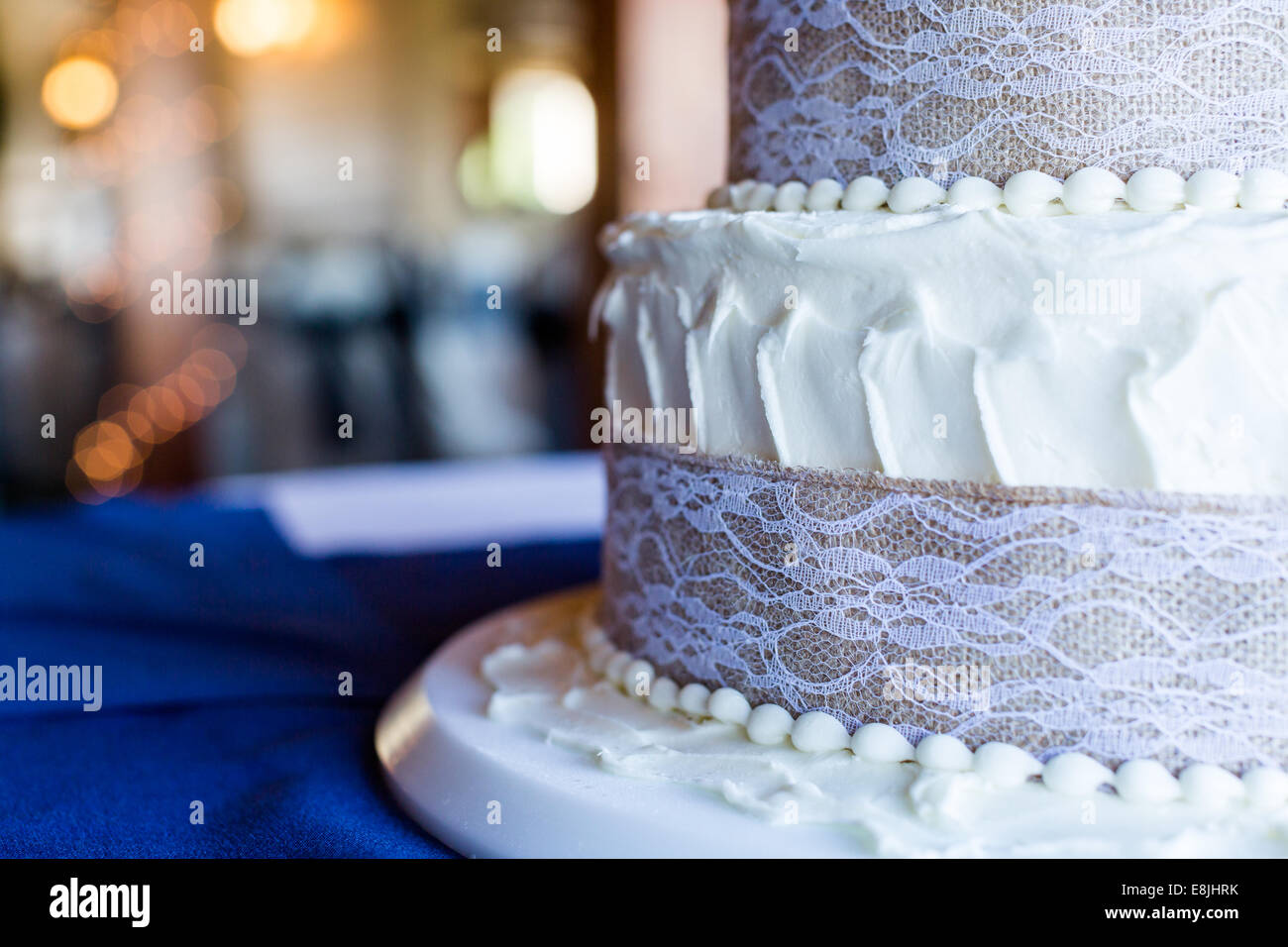 Three stack simple wedding cake in banquet hall Stock Photo - Alamy