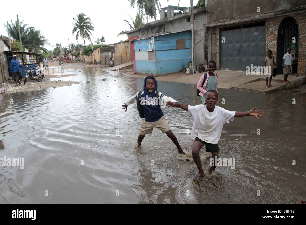 Africa african child lome togo water west africa hi-res stock ...