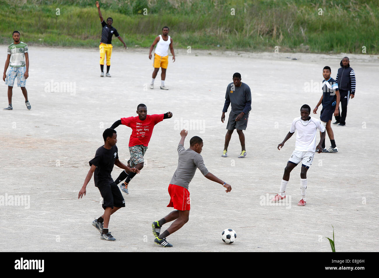 West Africans playing soccer in Tunis Stock Photo - Alamy