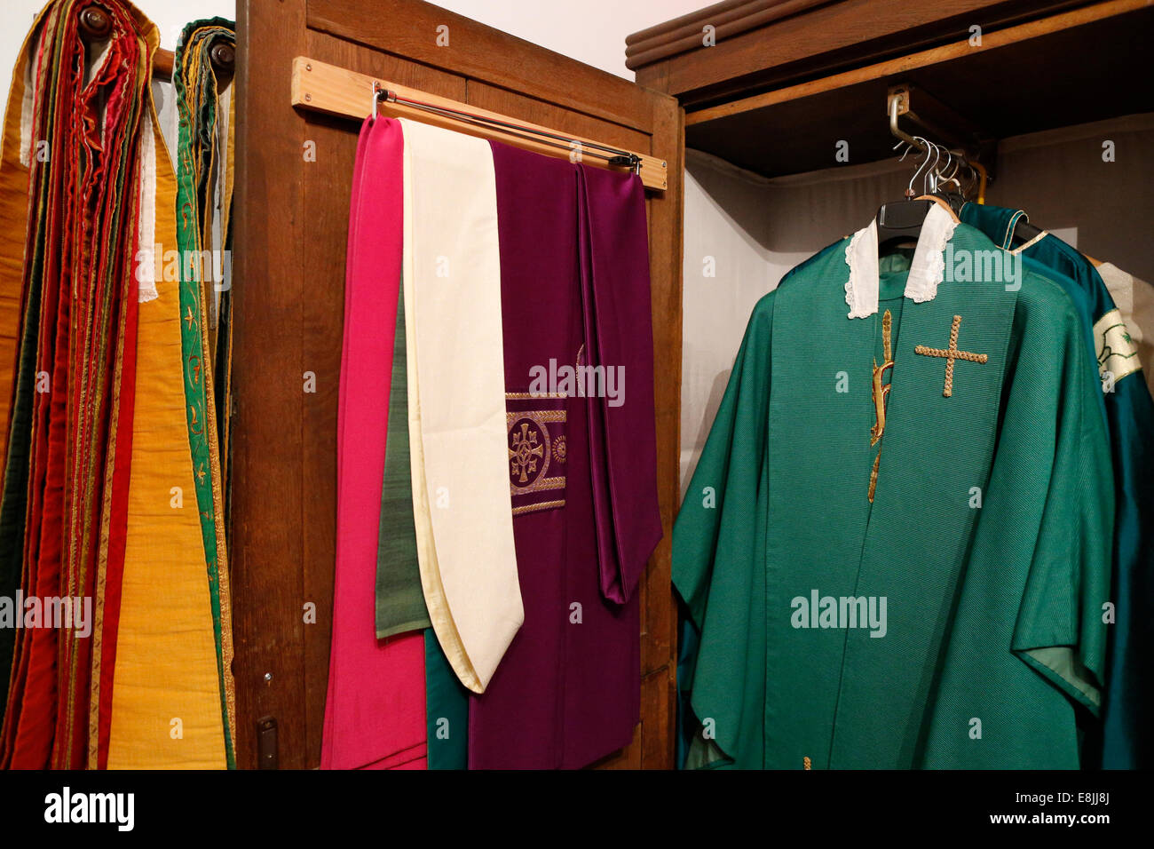 Priest in sacristy Stock Photo - Alamy