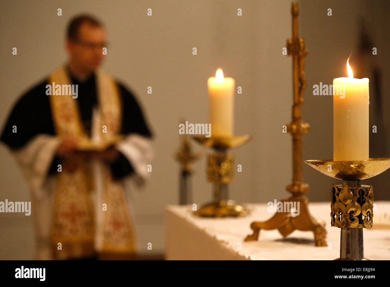 Altar and priest Stock Photo - Alamy