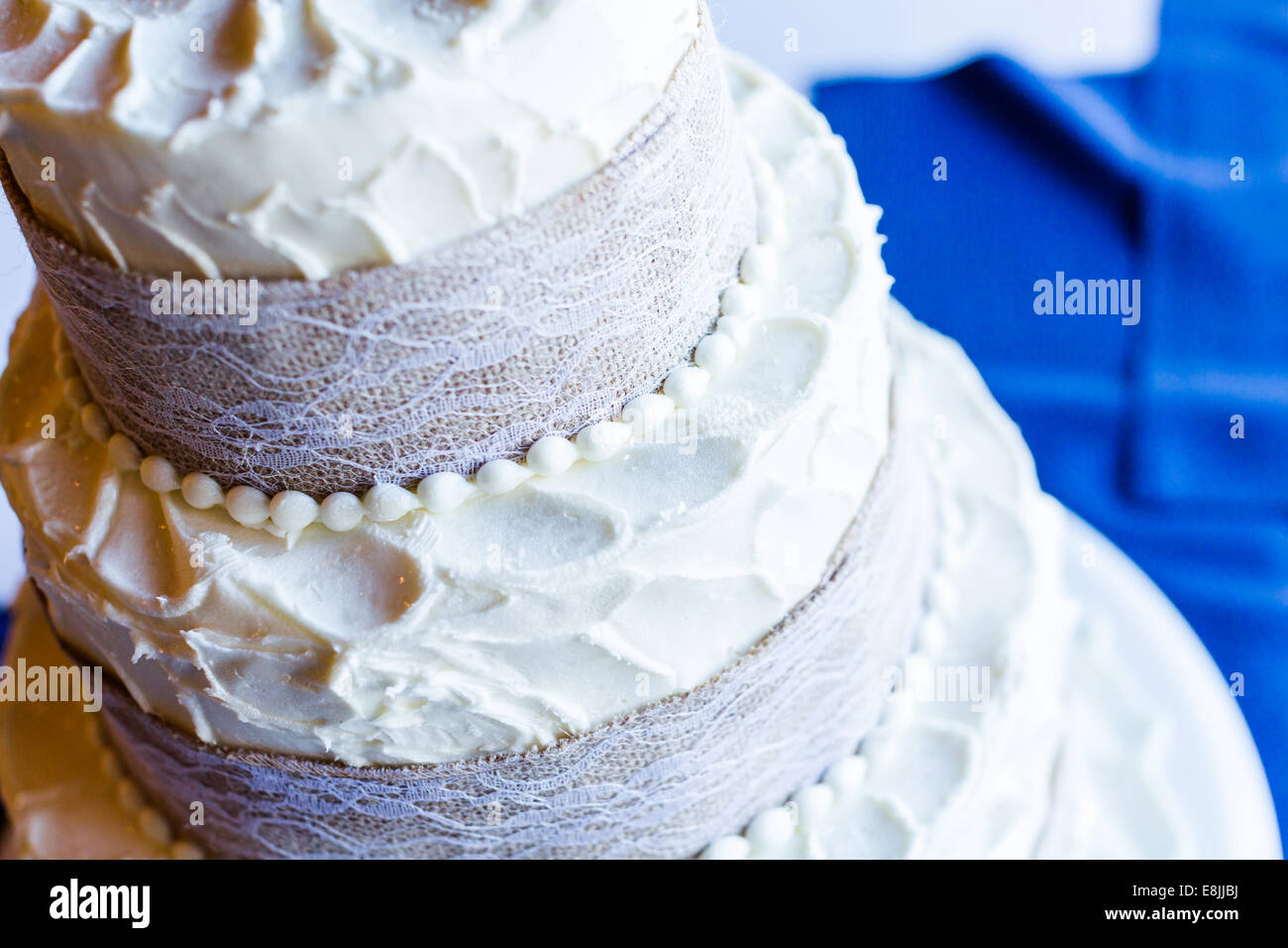 Three stack simple wedding cake in banquet hall Stock Photo - Alamy