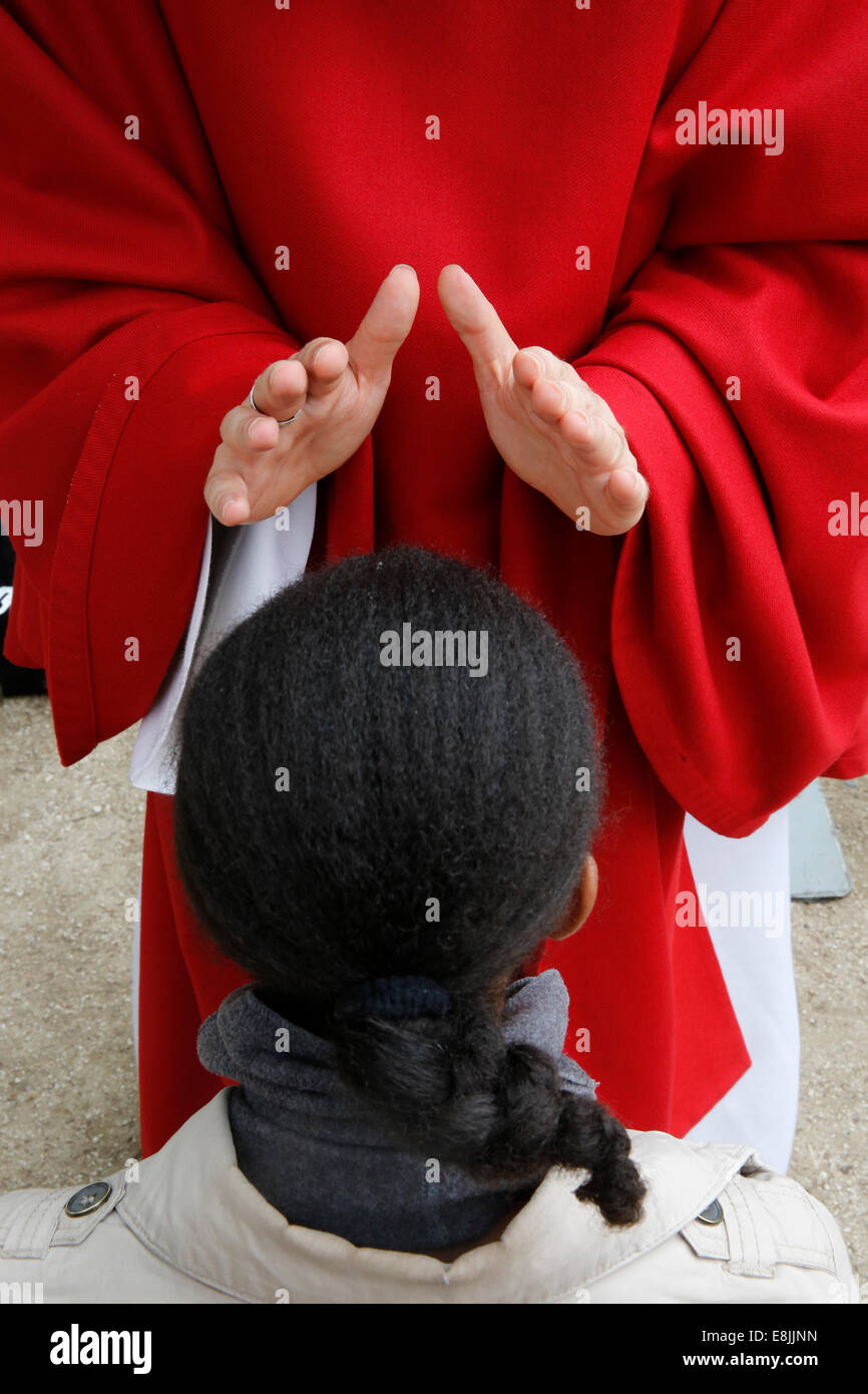 Catholic priest blessing person hi-res stock photography and images - Alamy