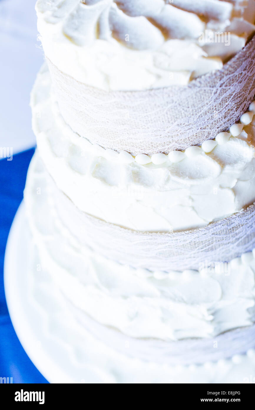 Three stack simple wedding cake in banquet hall Stock Photo - Alamy