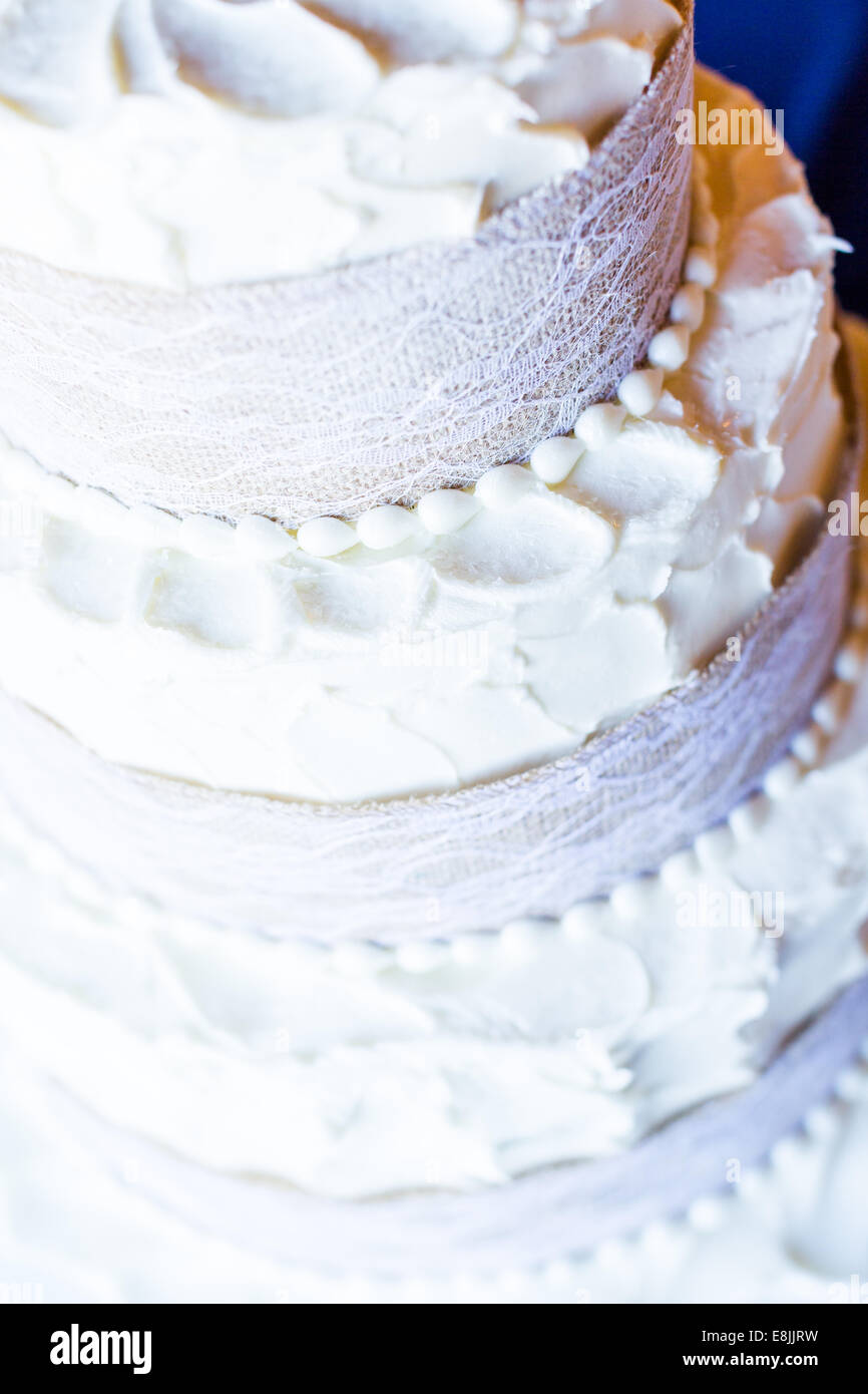 Three stack simple wedding cake in banquet hall Stock Photo - Alamy