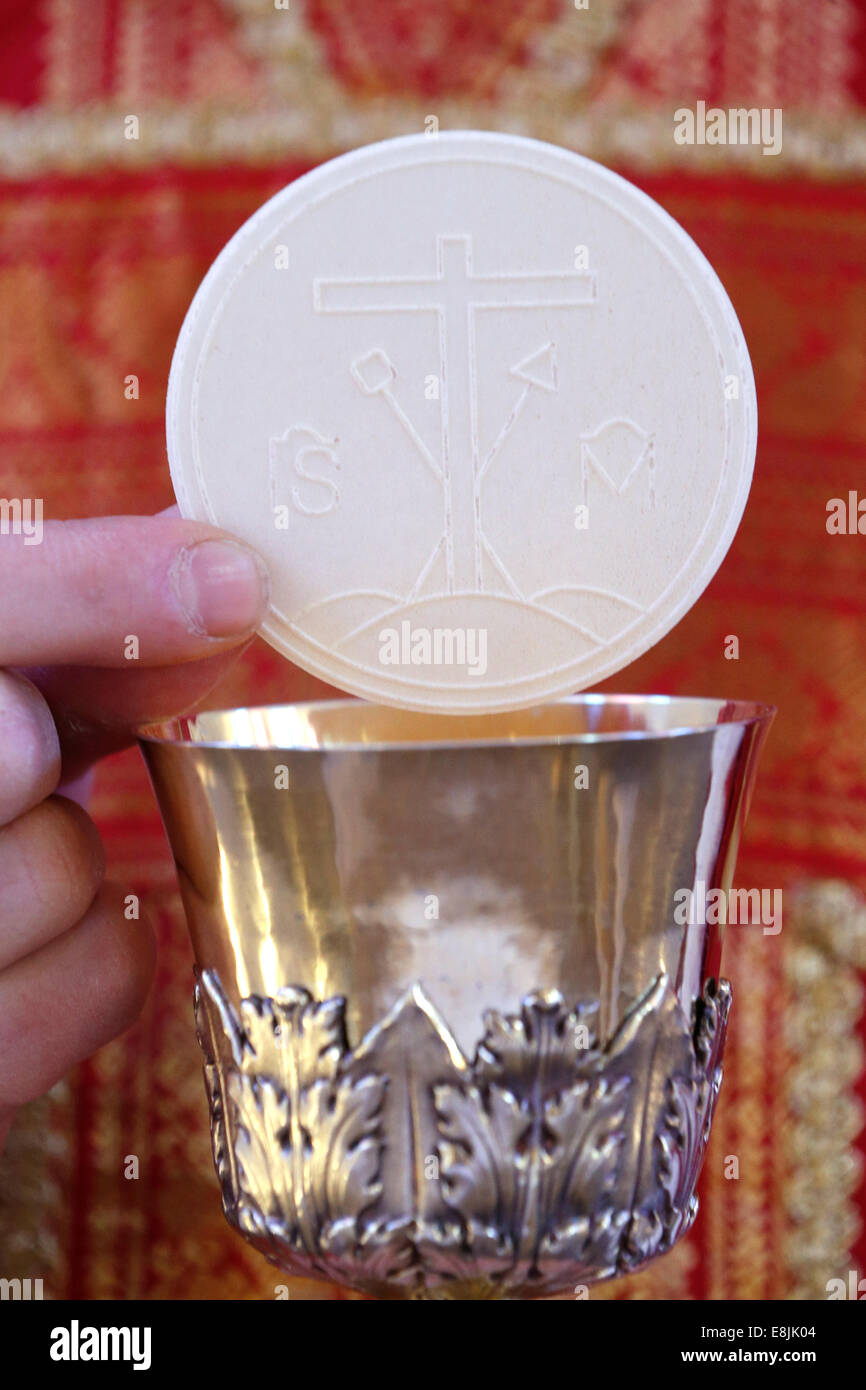 Catholic mass. Celebration of the Eucharist Stock Photo - Alamy