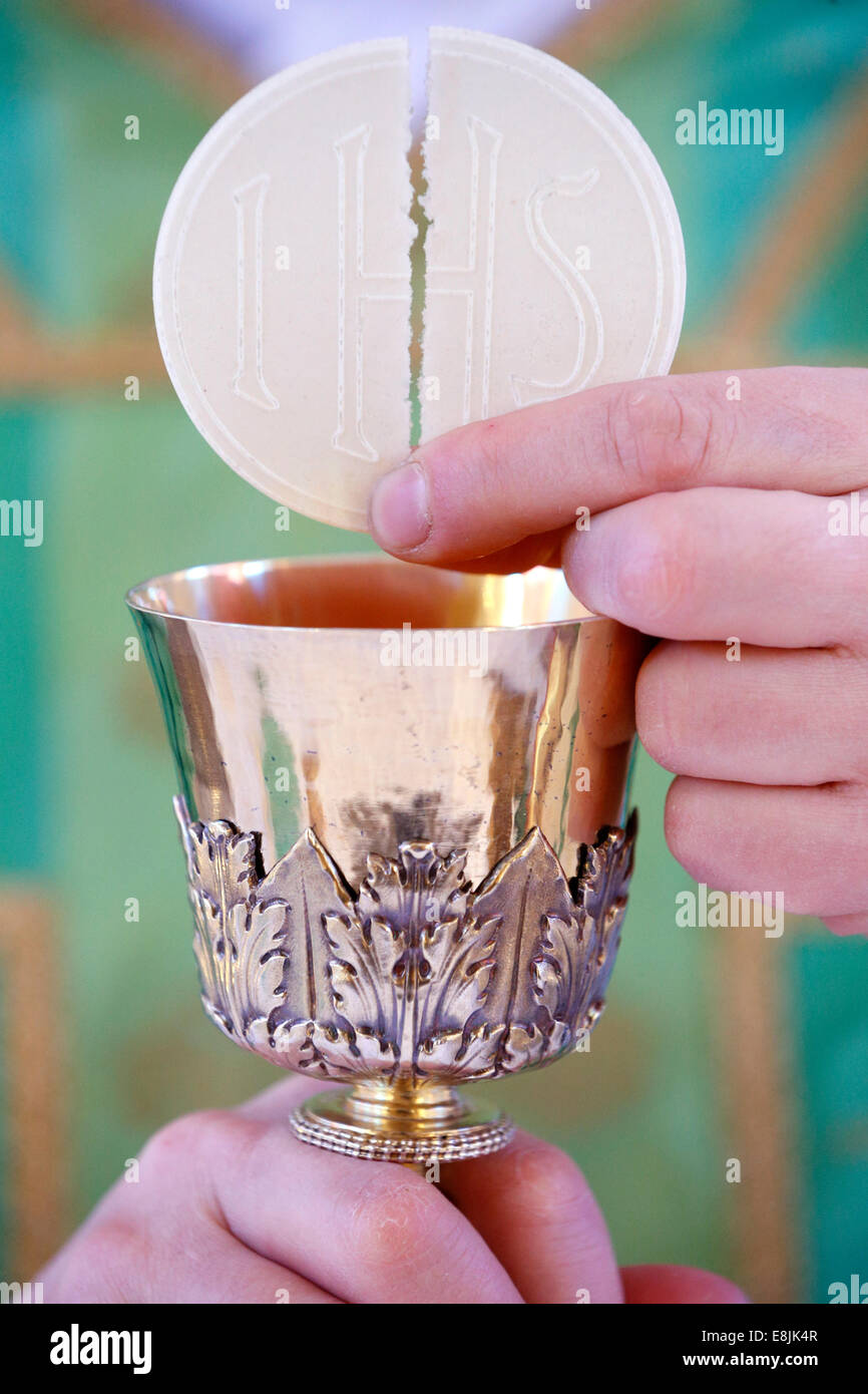 Catholic mass. Celebration of the Eucharist Stock Photo - Alamy