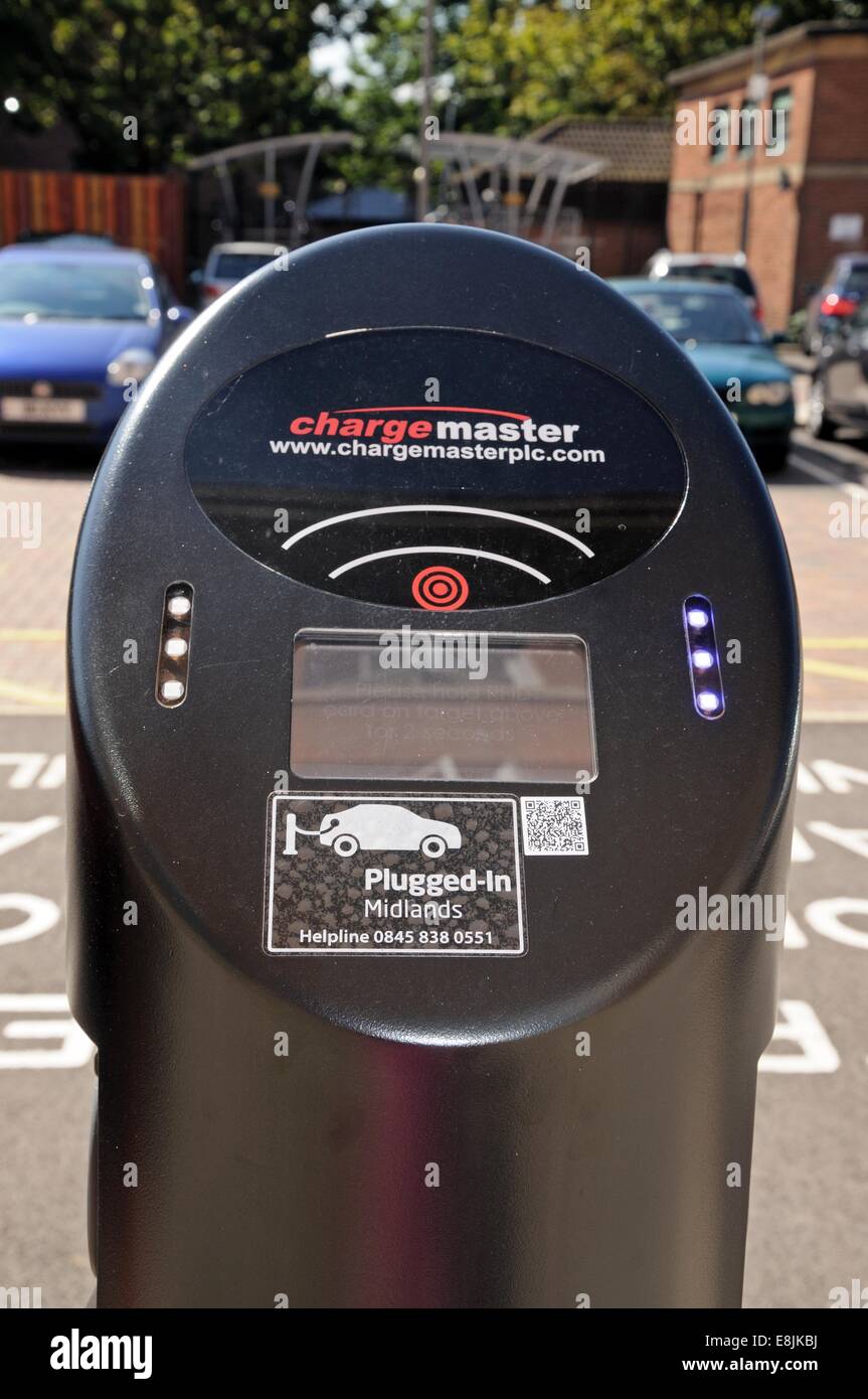 Modern electric car charging terminal in a city centre car park, Derby ...
