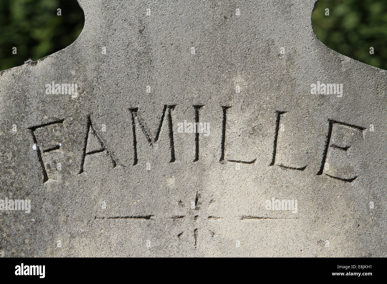 Inscription of the word "Family" on a tombstone Stock Photo - Alamy
