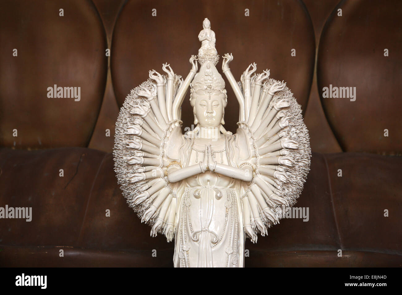 Bodhisattva Avalokitesvara with a thousand arms. Buddhist temple of the ...