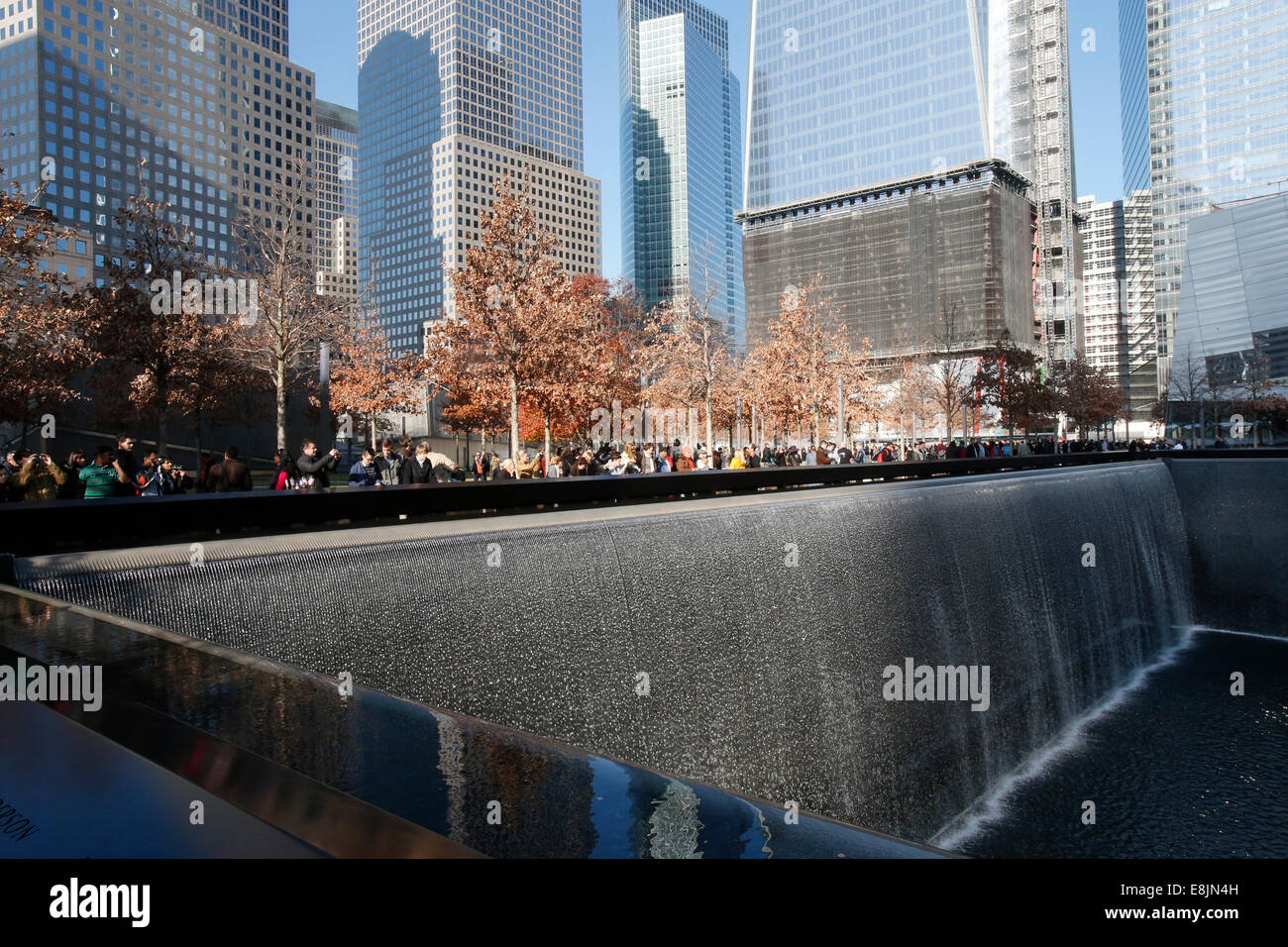 Ground zero. The National 9/11 Memorial at the site of the World Trade ...